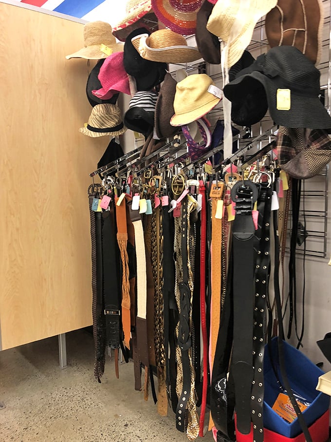 A fashionista's playground of accessories. These belts and hats have lived previous lives and are ready for their next adventure.