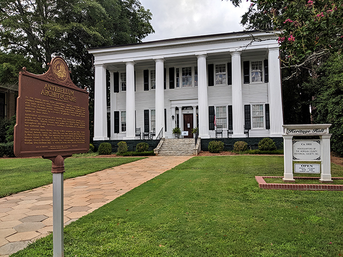Heritage Hall stands like a Southern gentleman in architectural form—dignified, elegant, and ready to welcome you with open columns.