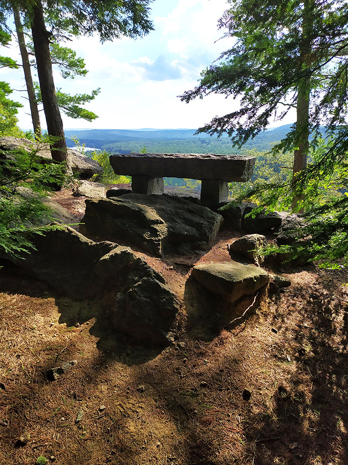 Nature's perfect viewpoint &ndash; this stone outcropping offers hikers a well-earned rest and a vista worth every step of the journey.