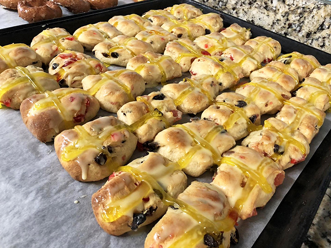 These fruit-studded pastries aren't just baked goods&mdash;they're edible sunshine with ribbons of lemon glaze catching the light.