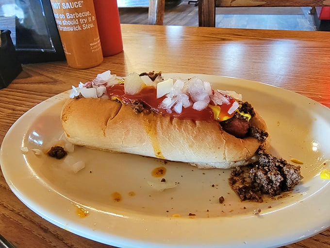 Even the hot dog gets the barbecue treatment here, topped with enough fixings to require a strategic approach to that first magnificent bite.
