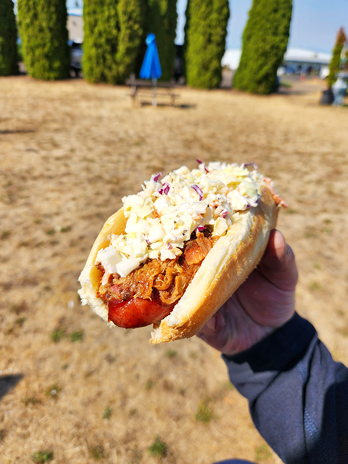 Hot dog elevated to art form &ndash; topped with crunchy slaw and nestled in a soft bun. Sometimes the simple pleasures are the most satisfying.