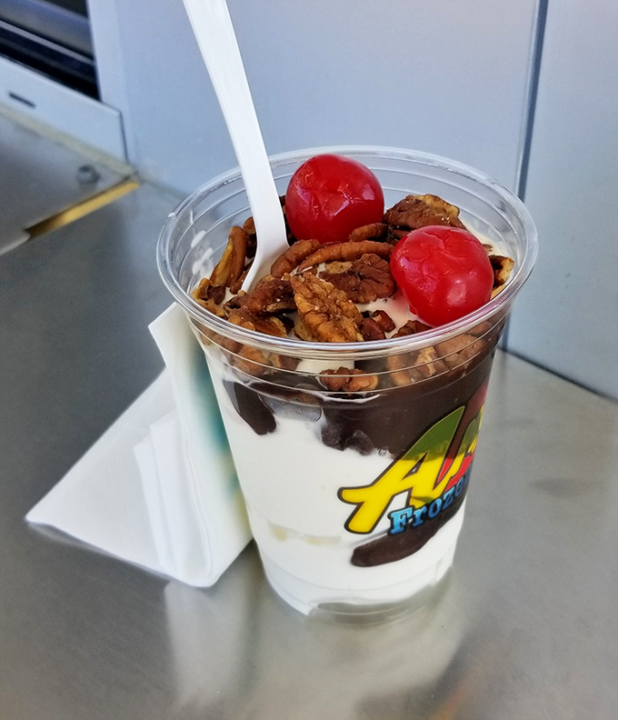 Hot fudge meets cold custard in a temperature tango that creates those slightly hardened chocolate ribbons&mdash;texture heaven in every spoonful.