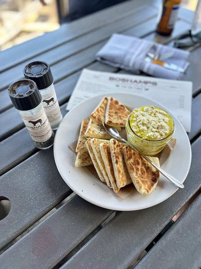 House-smoked yellowfin tuna dip with crispy flatbread &ndash; the kind of appetizer that ruins friendships when someone takes the last bite.