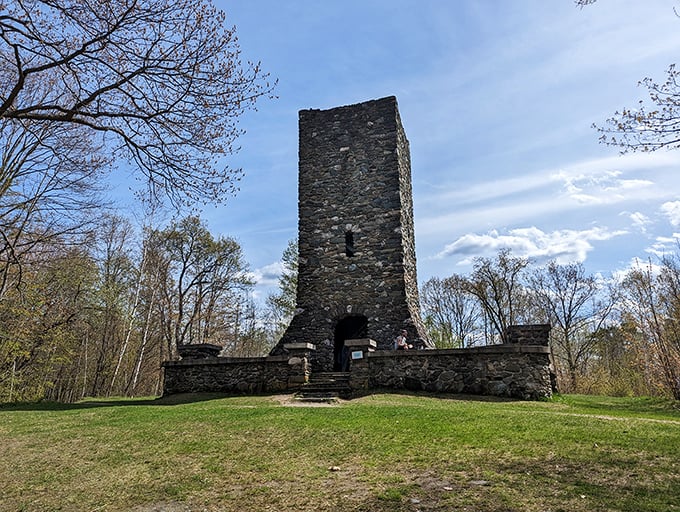 Hubbard Tower stands like a medieval sentinel, rewarding hikers with panoramic views that remind you why they call it the Green Mountain State.