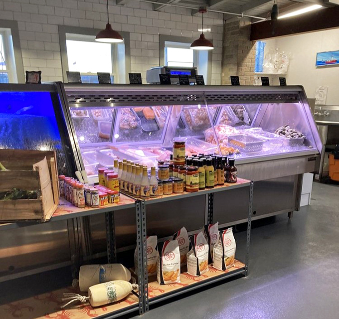 The seafood counter &ndash; where tomorrow's dinner stares back at you from behind glass, fresh enough to still be plotting escape.