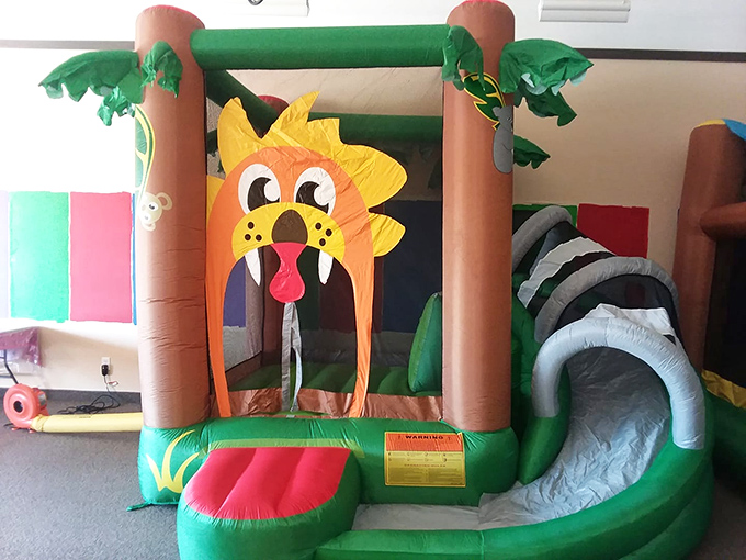 Parents' secret weapon: this inflatable jungle paradise keeps little ones entertained while adults debate whether they really need another pair of discounted sneakers.