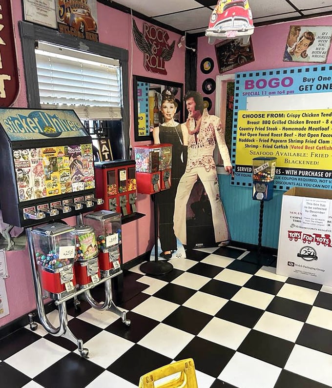 Pink walls, checkered floors, and Elvis watching over your meal—this isn't just retro, it's a time machine with table service.