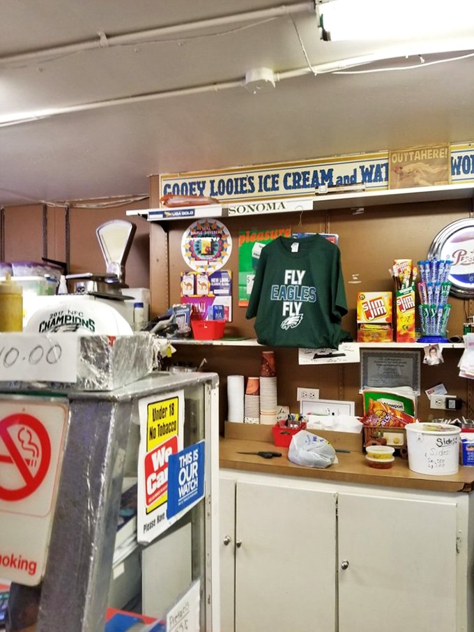 The "Gooey Looies Ice Cream" sign above the counter is like finding an Easter egg in your favorite movie&mdash;an unexpected bonus!