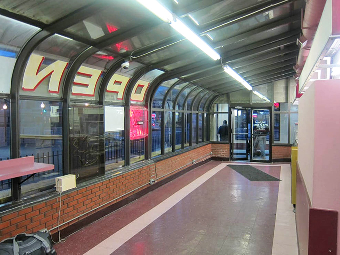 Late night or early morning, the curved glass corridor feels like a portal to a world where calories don't count.