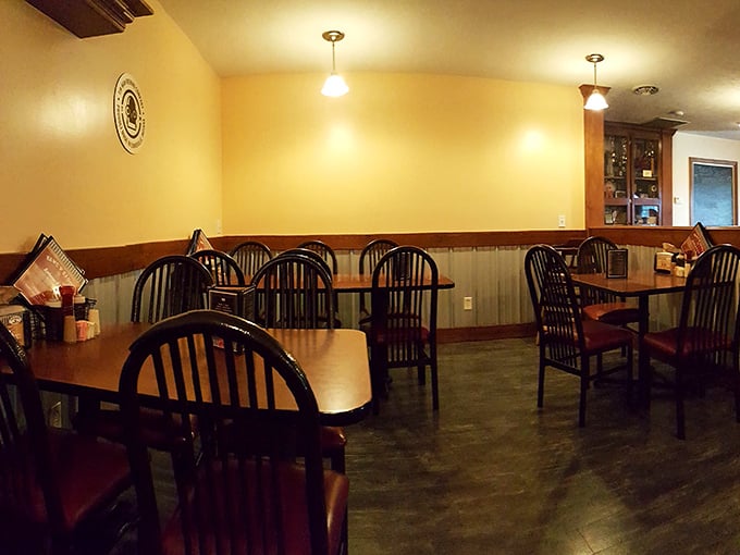 Simple wooden tables and chairs that have supported thousands of satisfied diners. No distractions from the serious business of eating.