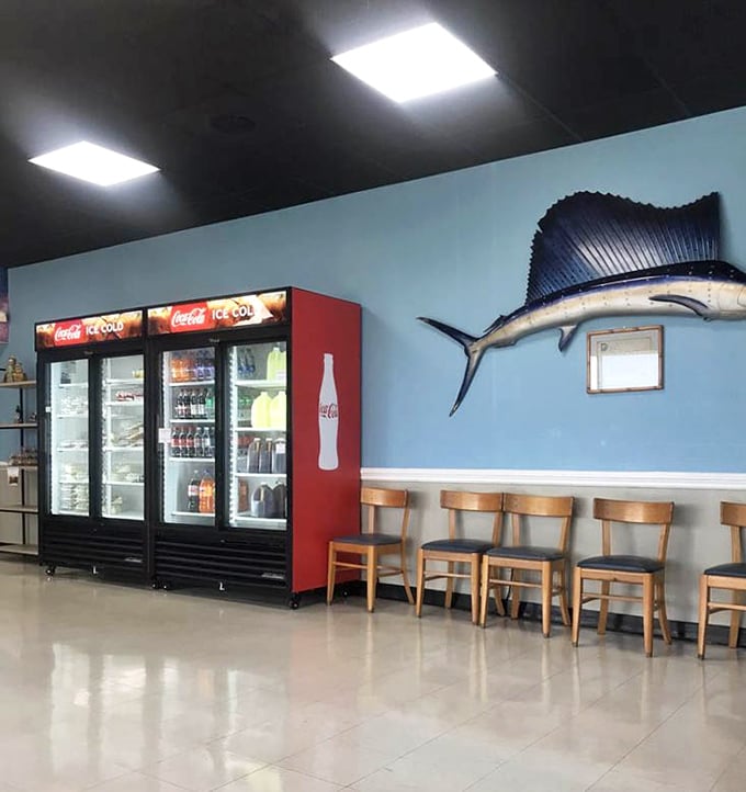 The nautical-themed waiting area features a mounted sailfish that's seen more dinner rushes than most restaurant managers. Blue walls evoke the ocean even in landlocked Fort Mill.