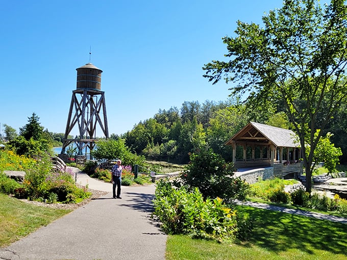 Island Park's historic water tower stands guard over gardens that bloom budget-friendly. 