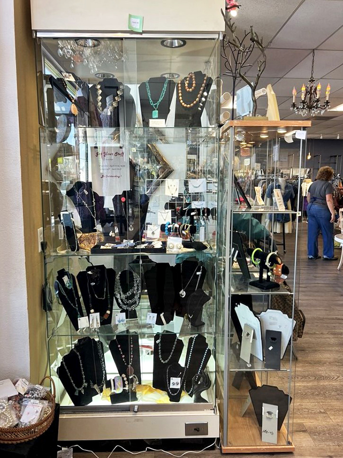 Behind glass, vintage jewelry waits for its second act&mdash;like supporting actors ready for their star turn on your collar.