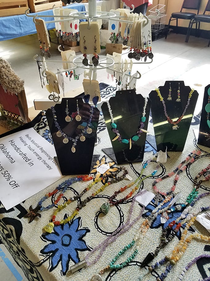 Handcrafted jewelry sparkles under market lights, each piece telling a different story through turquoise, silver, and beads arranged with artistic precision.