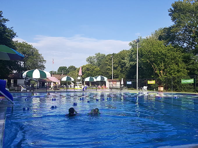 Nothing says "summer in small-town America" quite like the community pool. Those green and white umbrellas have shaded generations of swimmers.