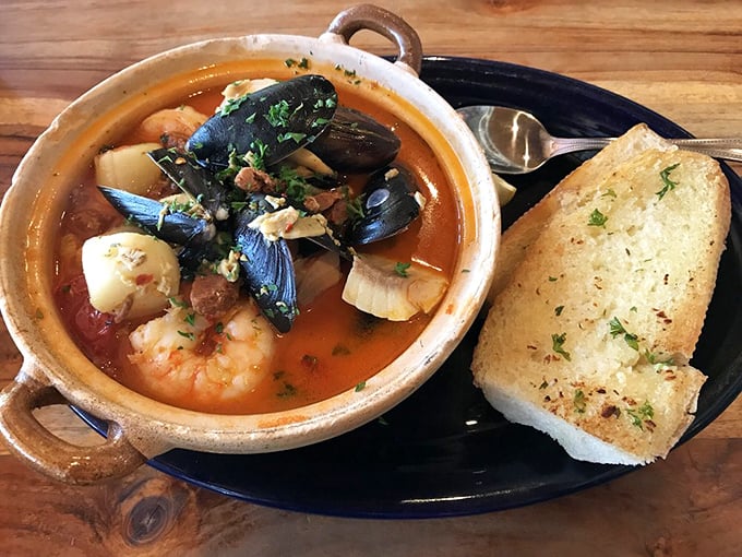 La Playa seafood stew&mdash;where the ocean meets the pot in a spicy, soul-warming embrace that would make Neptune himself request seconds.