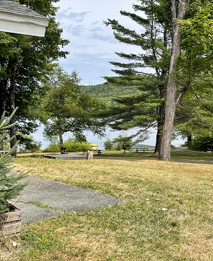 Lake George's shoreline offers the kind of tranquility that makes you wonder why anyone would choose a crowded beach resort over this peaceful Maine gem.