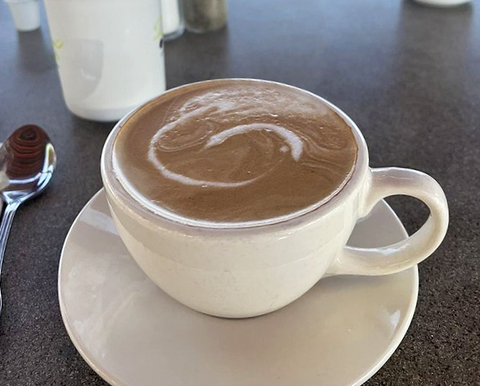This isn't just hot chocolate&mdash;it's liquid comfort in ceramic form, topped with a swirl that hypnotizes you into ordering seconds.