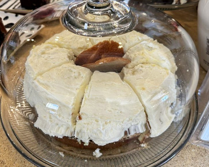 Under glass like the treasure it is. This frosted beauty waits patiently to become someone's very wise decision.