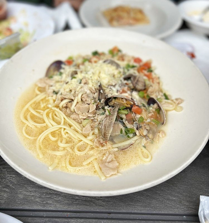 Pasta meets ocean in this perfect marriage. The linguini acts like a dance floor where clams perform their delicious waltz.