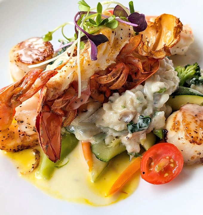 When a lobster tail and scallops share a plate, magic happens. This seafood masterpiece is what ocean dreams are made of.