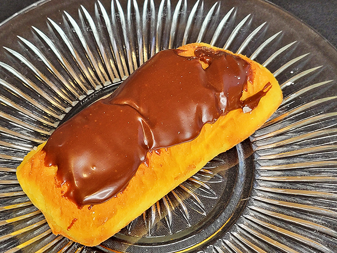 That chocolate-glazed Long John looks like it could solve at least three of your current problems, maybe four.