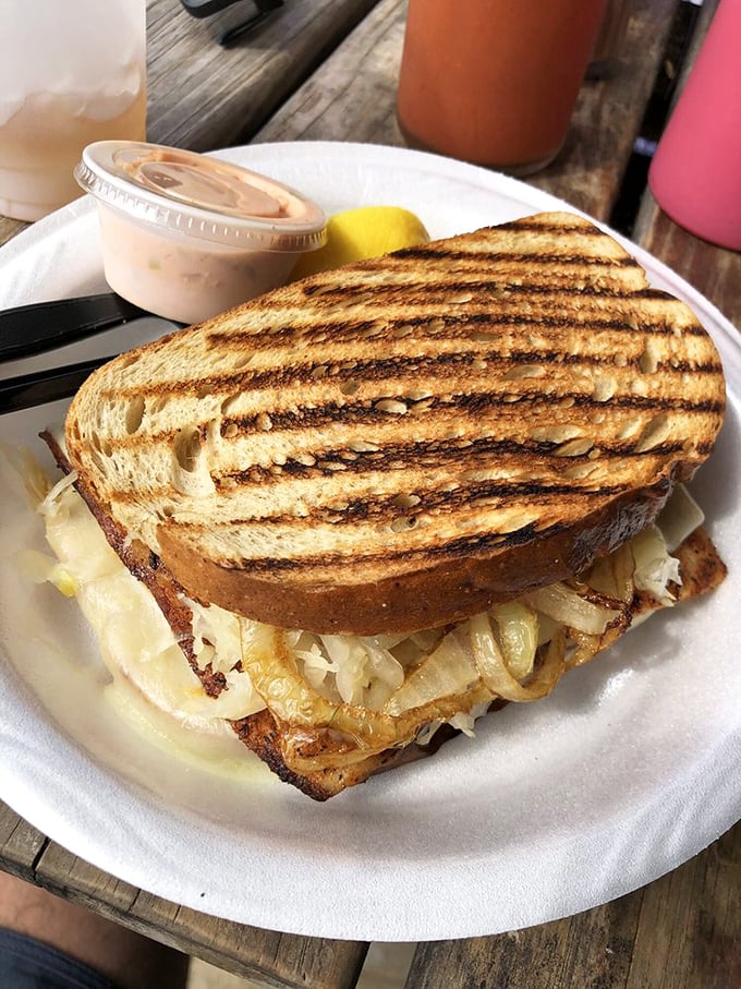 This grilled sandwich isn't just lunch &ndash; it's architecture. Layers of flavor stacked between perfectly toasted bread with a side of something creamy that's calling my name.