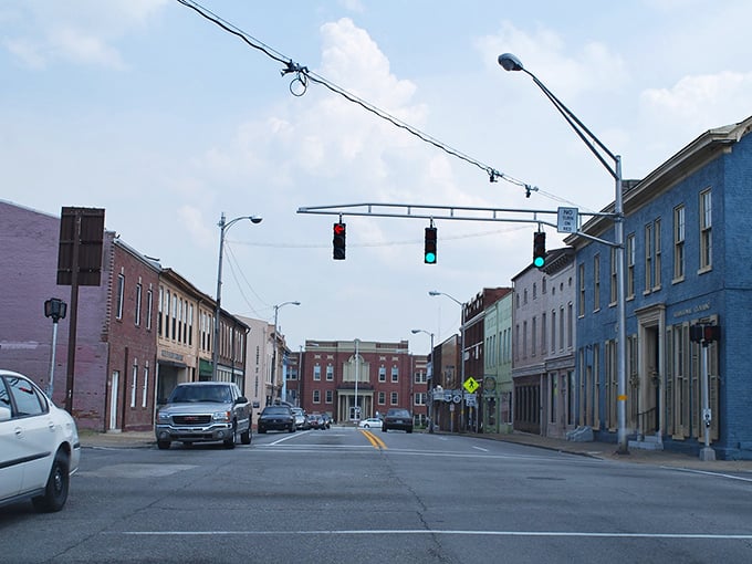 Main Street's colorful buildings create a real-life palette where traffic lights are merely suggestions and nobody's in a particular hurry.