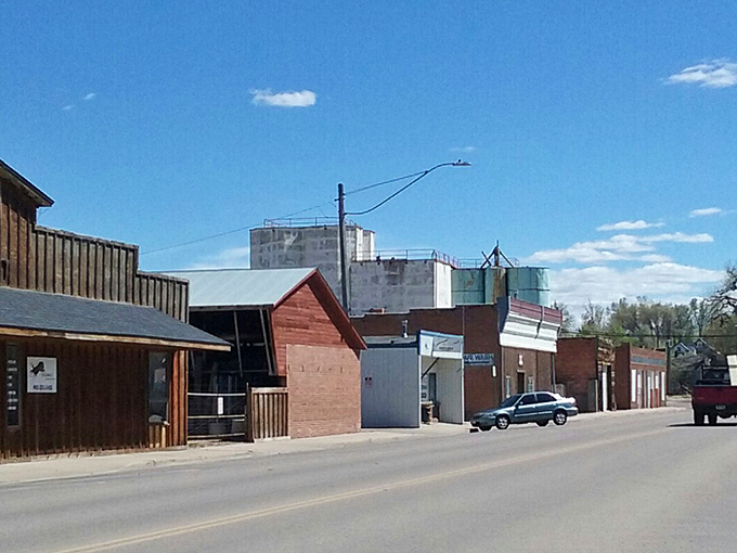 Main Street tells Kersey's story through its architecture—modest buildings with big purposes, backed by grain elevators that hint at agricultural roots.