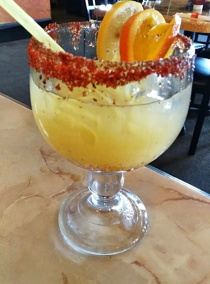 A margarita with attitude&mdash;that chili-salt rim isn't messing around. Citrus slices stand at attention, ready for their supporting role.