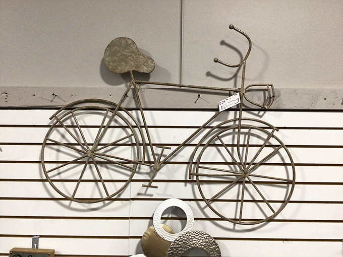 Metal bicycle wall art that lets you claim you're into cycling without the uncomfortable seats or spandex commitment.