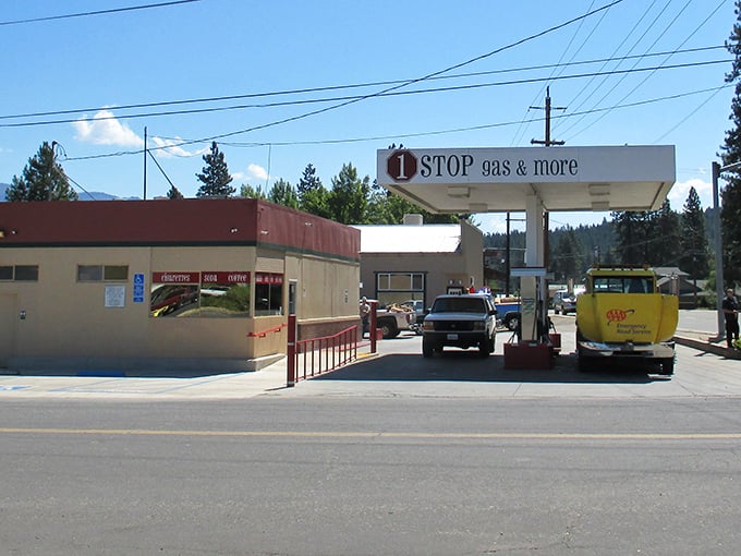 This isn't just a gas station; it's the community bulletin board, impromptu meeting spot, and unofficial welcome center all in one pump.