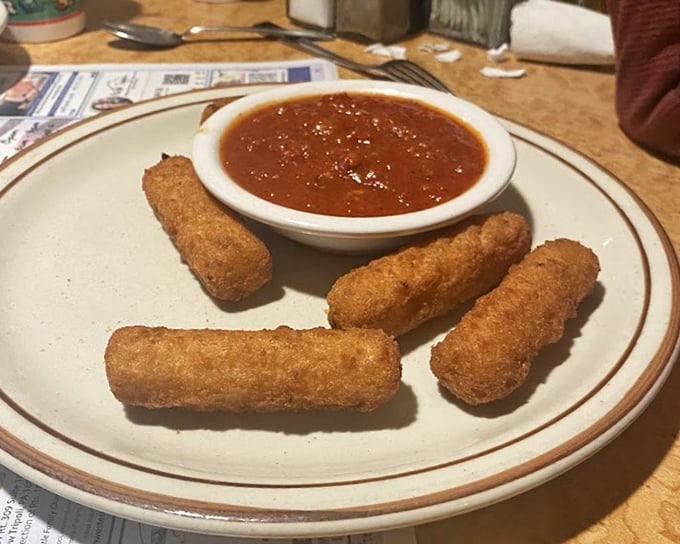 Mozzarella sticks with marinara &ndash; the universal language of "Yes, you deserve this" in crispy, gooey form.
