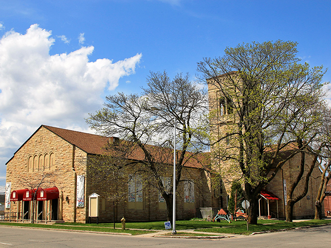 This stone church stands as testament to Escanaba's enduring faith traditions, its tower reaching skyward like the aspirations of its earliest settlers.