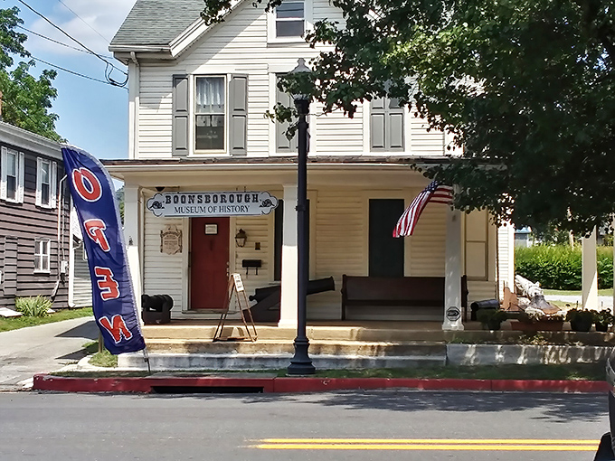 The Boonsborough Museum of History welcomes visitors with small-town charm and an "OPEN" flag that flutters like an eager tour guide.