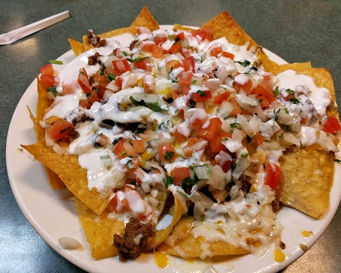 Nachos that laugh in the face of sad ballpark versions. These are loaded with the good stuff&mdash;no dry chips lurking underneath this mountain of deliciousness. 