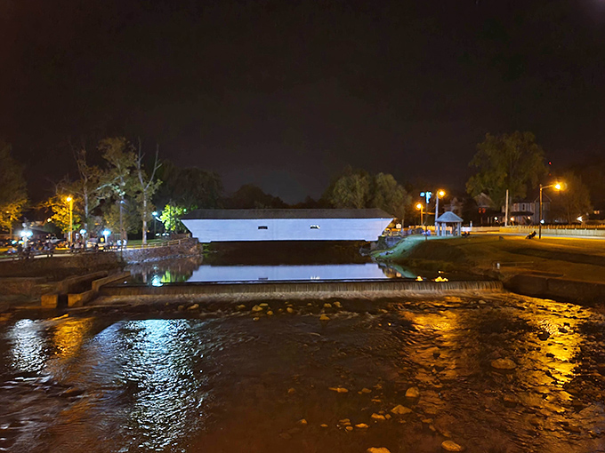 After dark, the illuminated bridge becomes even more magical, its white form hovering over the water like a ghostly apparition from another century.