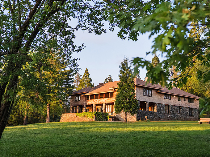 The North Star House glows in golden hour light, its stone walls and craftsman details reminding us that mining barons knew a thing or two about curb appeal.