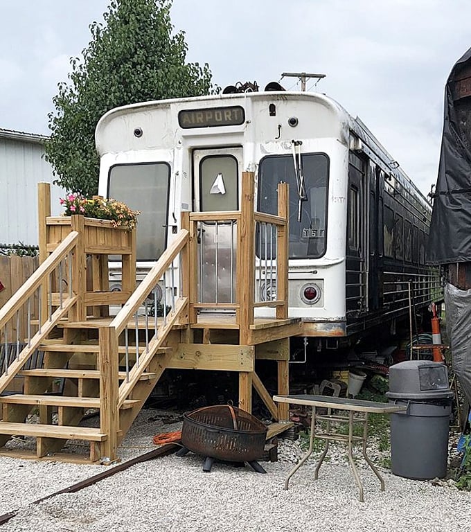 Airport reads the destination sign, from an era when getting to the terminal meant riding the rails instead of sitting in traffic.