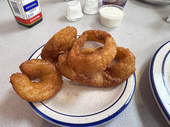 Onion rings with the perfect crunch-to-squish ratio. That golden batter is the evening gown these onions wore to the deep-fryer ball.
