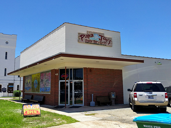 Papa Joe's Oyster Bar promises seafood without pretension – where plastic bibs are badges of honor, not fashion faux pas.