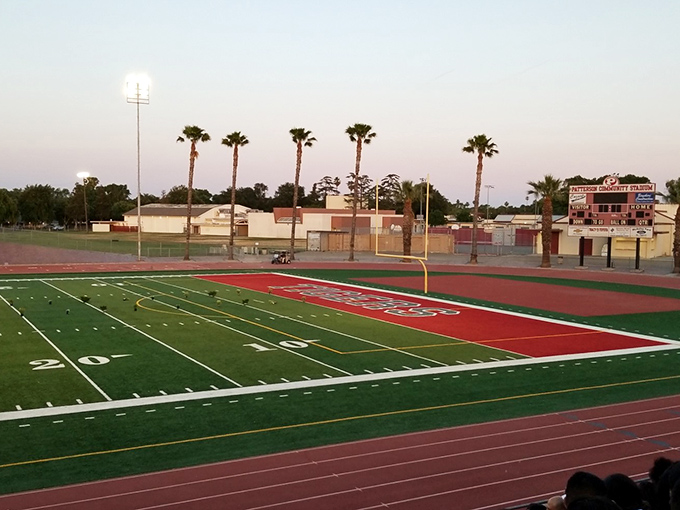 Friday night lights shine brightest at Patterson Community Stadium, where small-town dreams play out on perfectly striped turf.