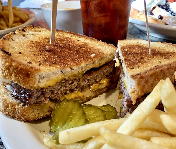 The patty melt&mdash;that glorious intersection where burger meets grilled cheese, creating a sandwich so perfect it deserves its own Hollywood star.