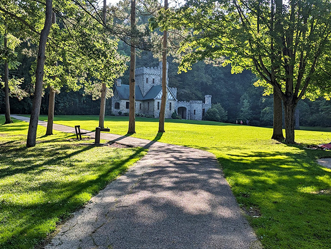 Sunlight filters through the trees, creating a dappled path that practically begs you to follow it to stone-walled adventures.