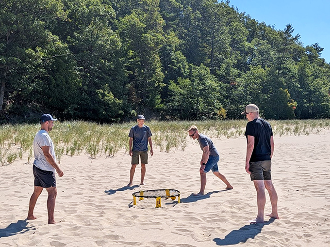 Beach sports: where "I'm too old for this" meets "Watch me score this point!" in glorious sandy competition.