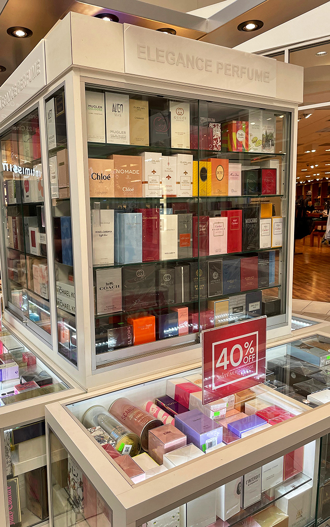 The perfume display case&mdash;a fragrance library where you can check out a new personality for 40% less than department store prices.