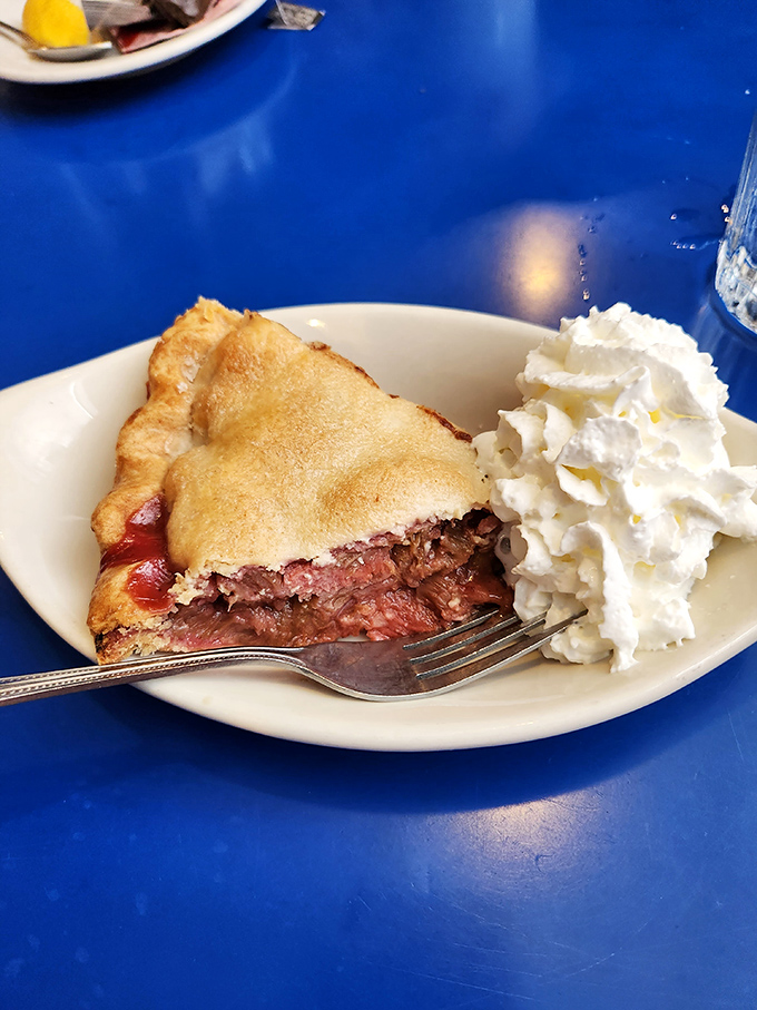 Pie that doesn't need Instagram filters – that crimped crust and ruby filling are showing off naturally. The whipped cream is just the supporting actor.