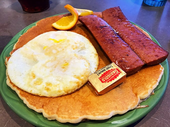 A pancake so perfectly round it could double as a frisbee, paired with what might be the most photogenic sunny-side-up egg in Anchorage.