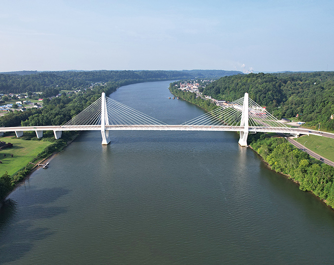 The Pomeroy-Mason Bridge connects two states and countless possibilities, spanning the Ohio River like a gleaming promise of adventure.